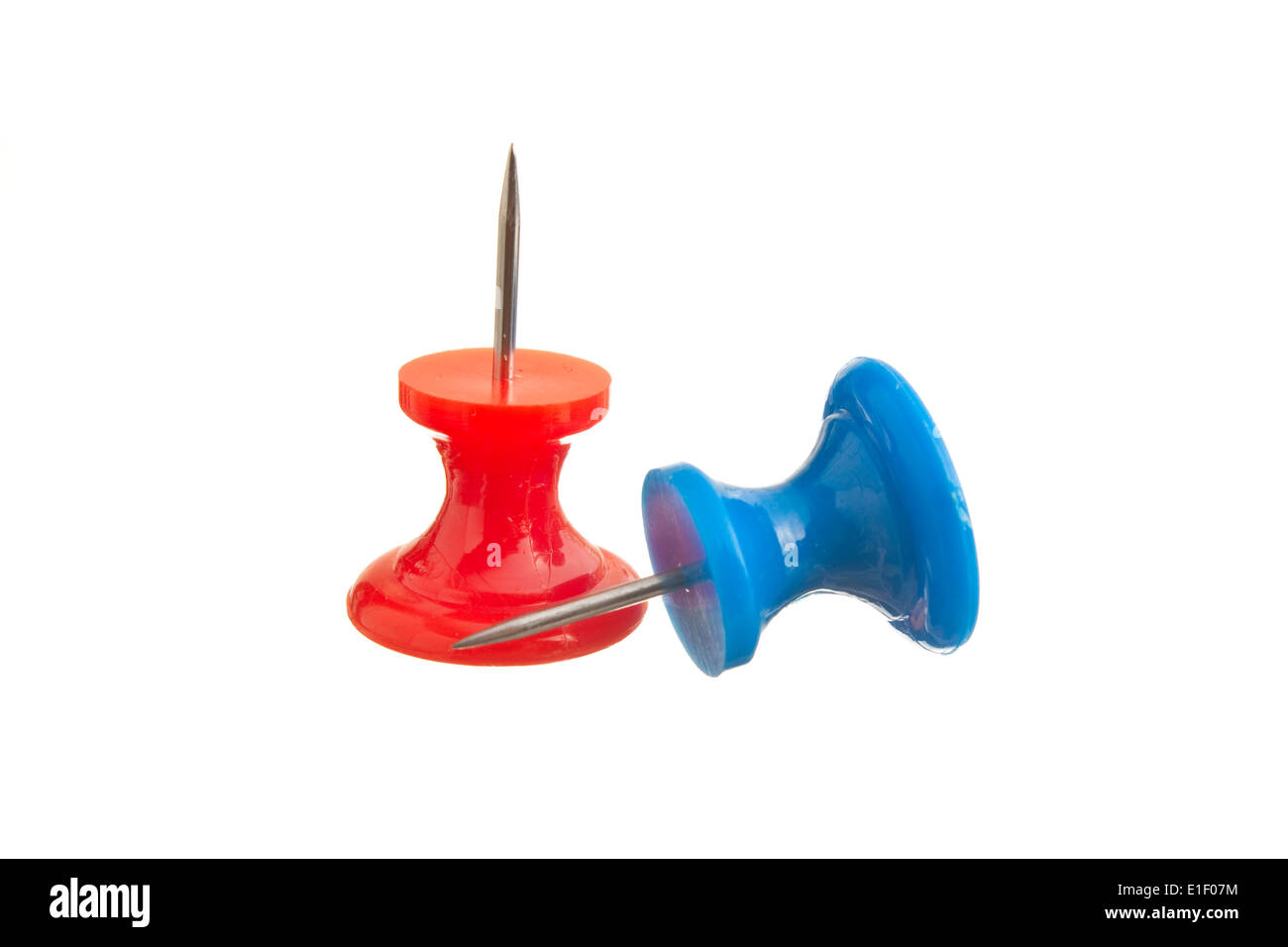red and blue pushpin isolated on white background Stock Photo - Alamy