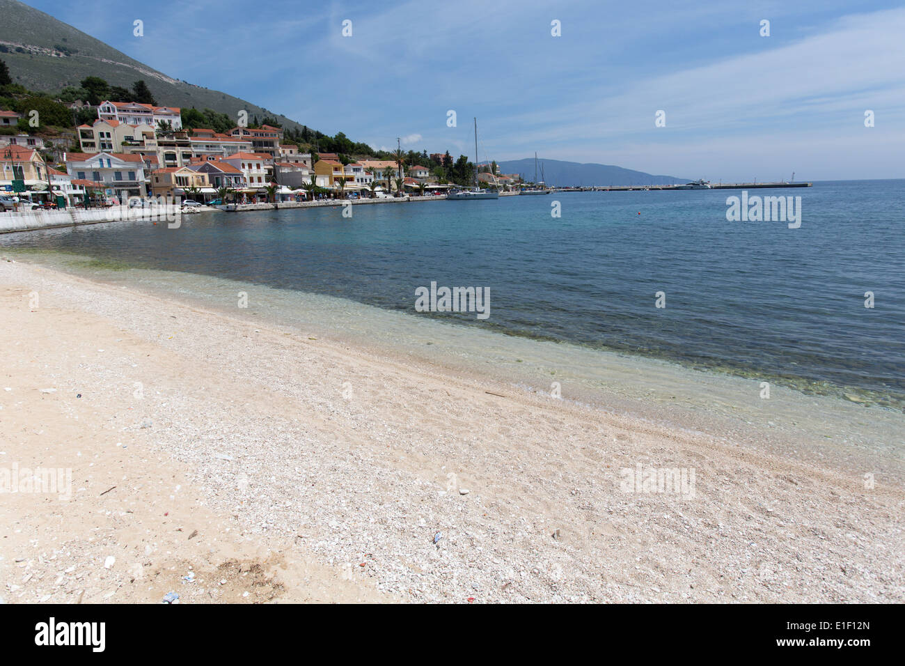 Village of Agia Efimia, Kefalonia. Agia Efimia’s pebbly beach with the ...