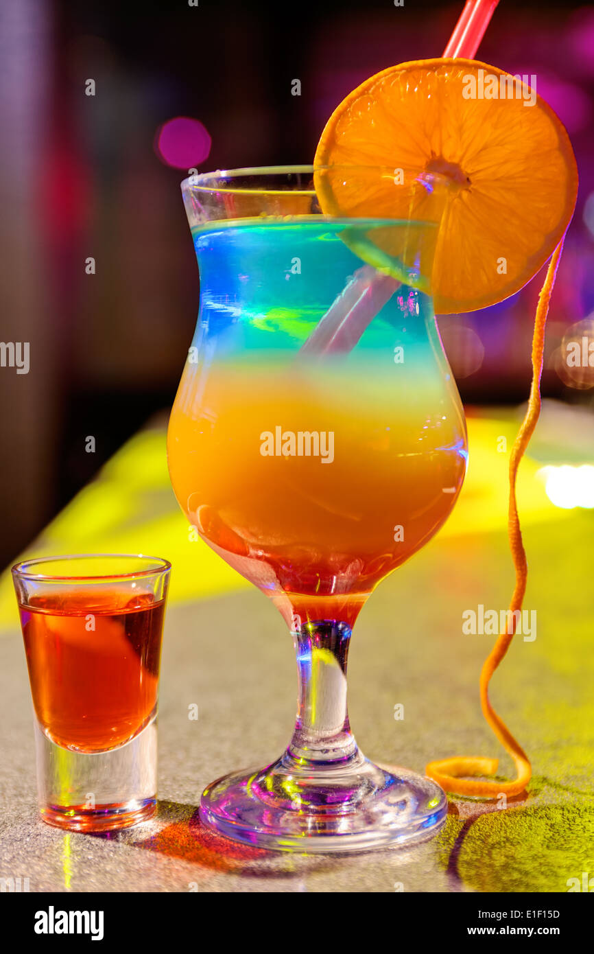 cocktail at bar in a night club with vivid colors Stock Photo - Alamy