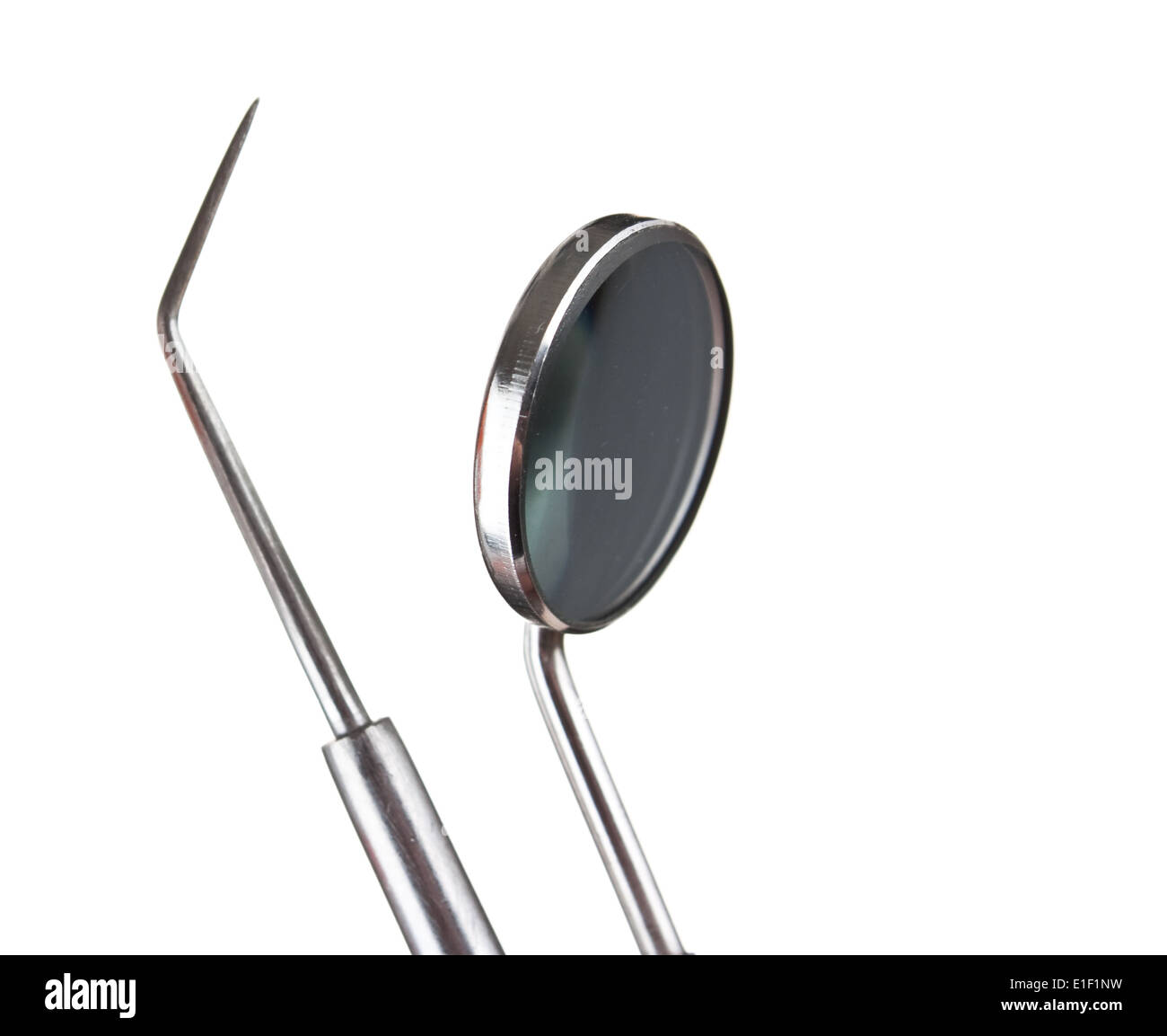 Dental instruments on stainless Cut Out Stock Images & Pictures - Alamy