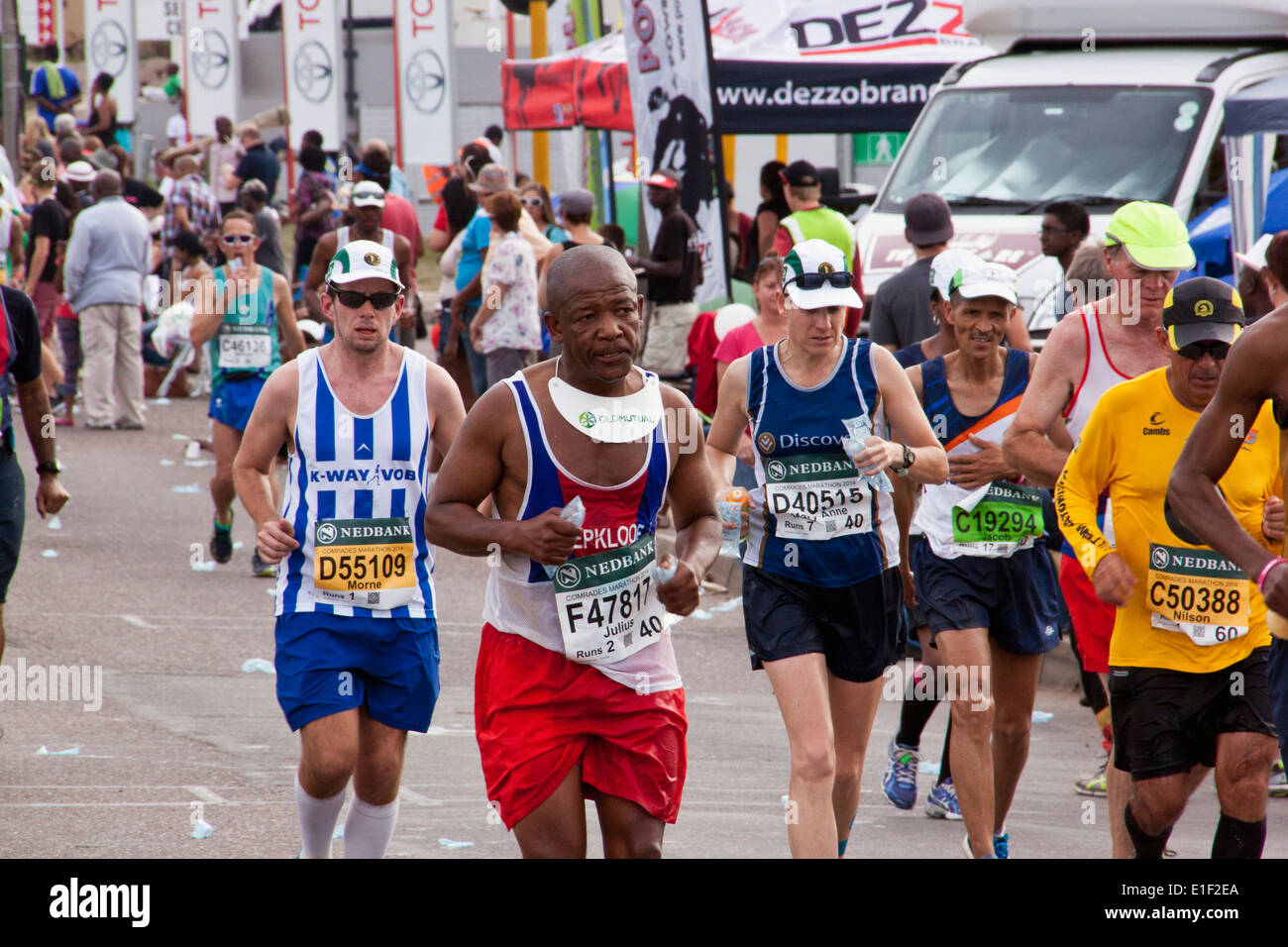 Many Determined Competitors compete in the Comrades Ultra Marathon ...