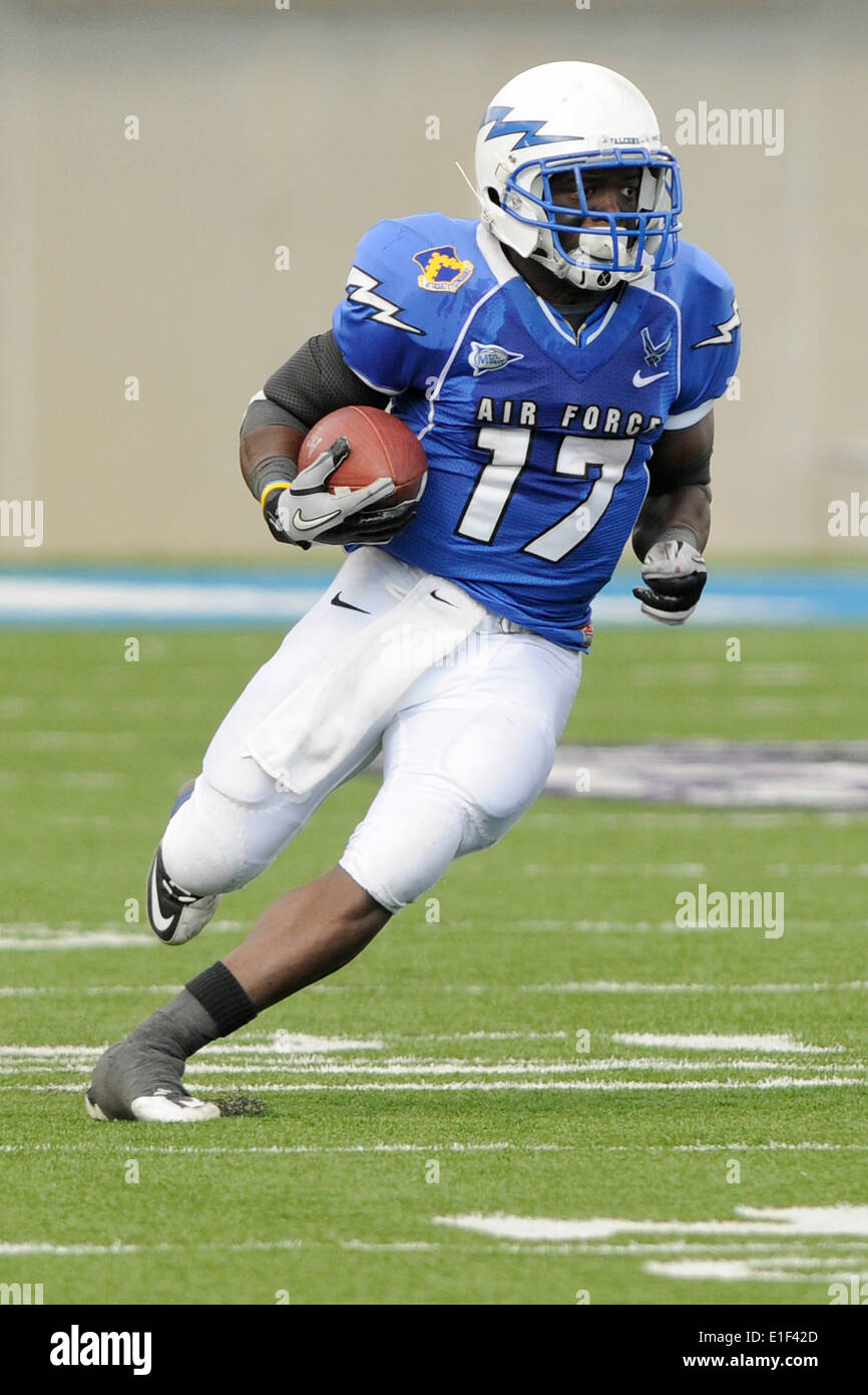 U.S. Air Force Academy Cadet Asher Clark runs the ball up the field ...
