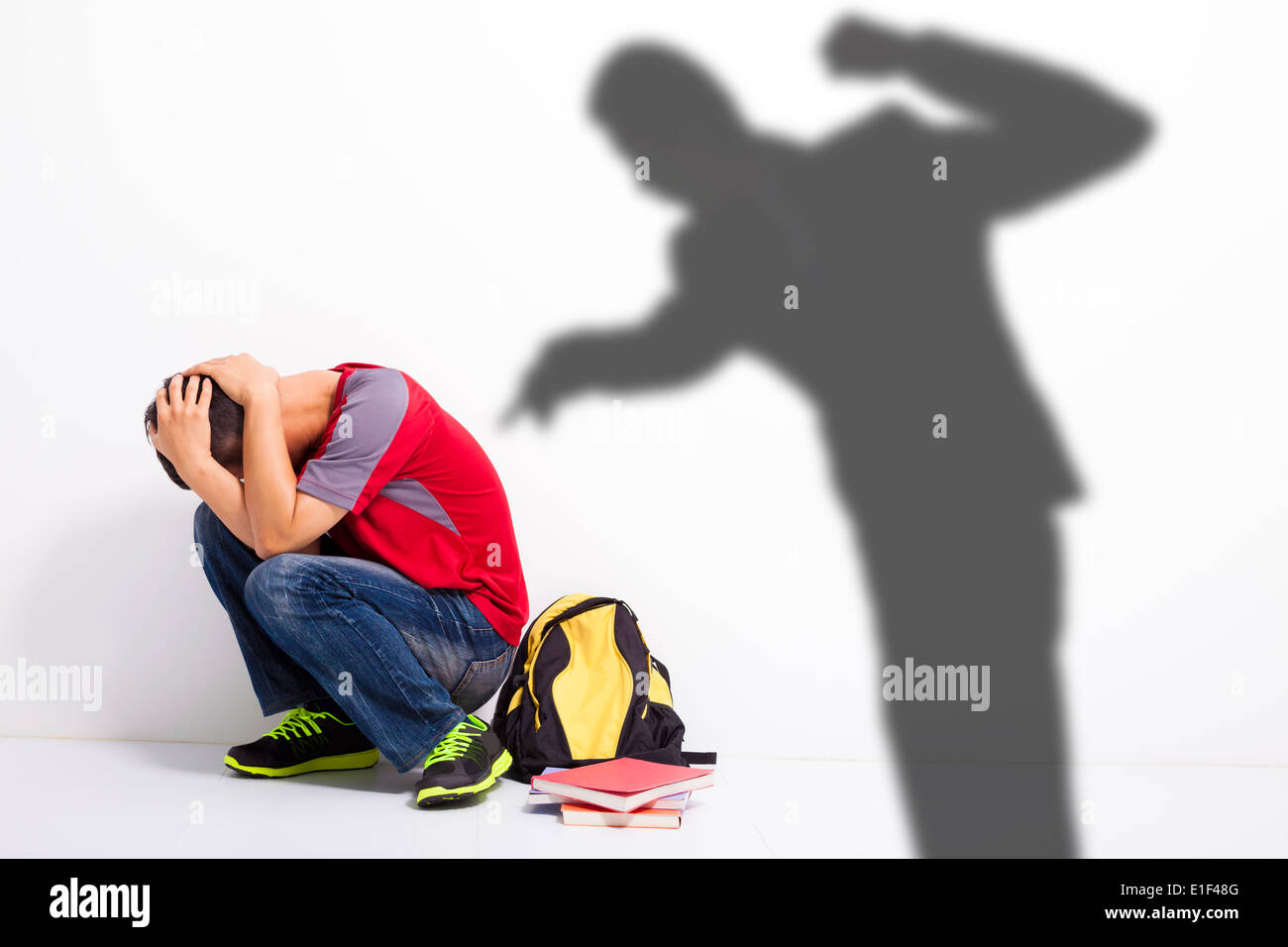 Man squatting gesturing with his hand hi-res stock photography and ...