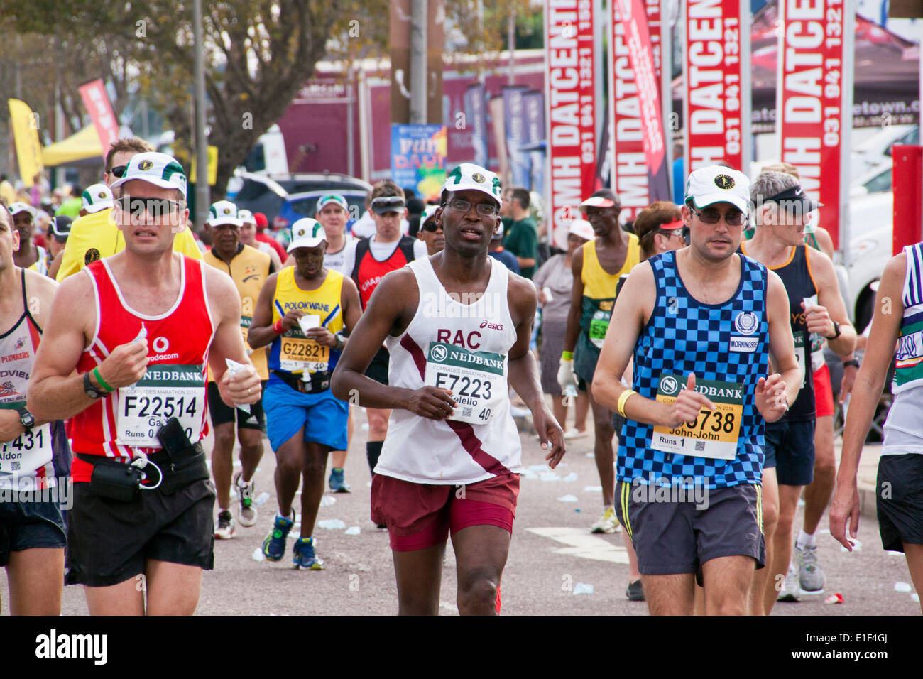 Many unknown runners competing in the long distance Comrades Ultra ...