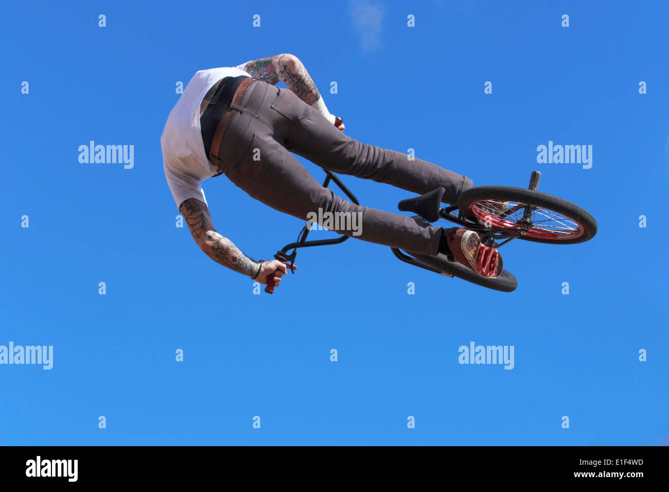 BMX stunt rider in full flight Stock Photo - Alamy
