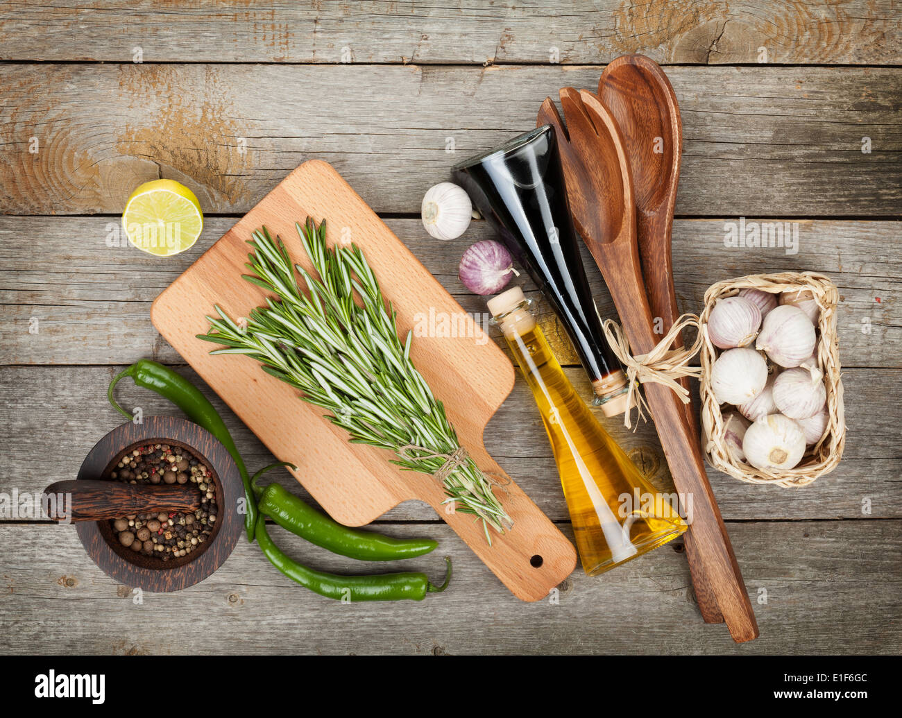 Herbs, spices and seasoning over wooden table background Stock Photo ...