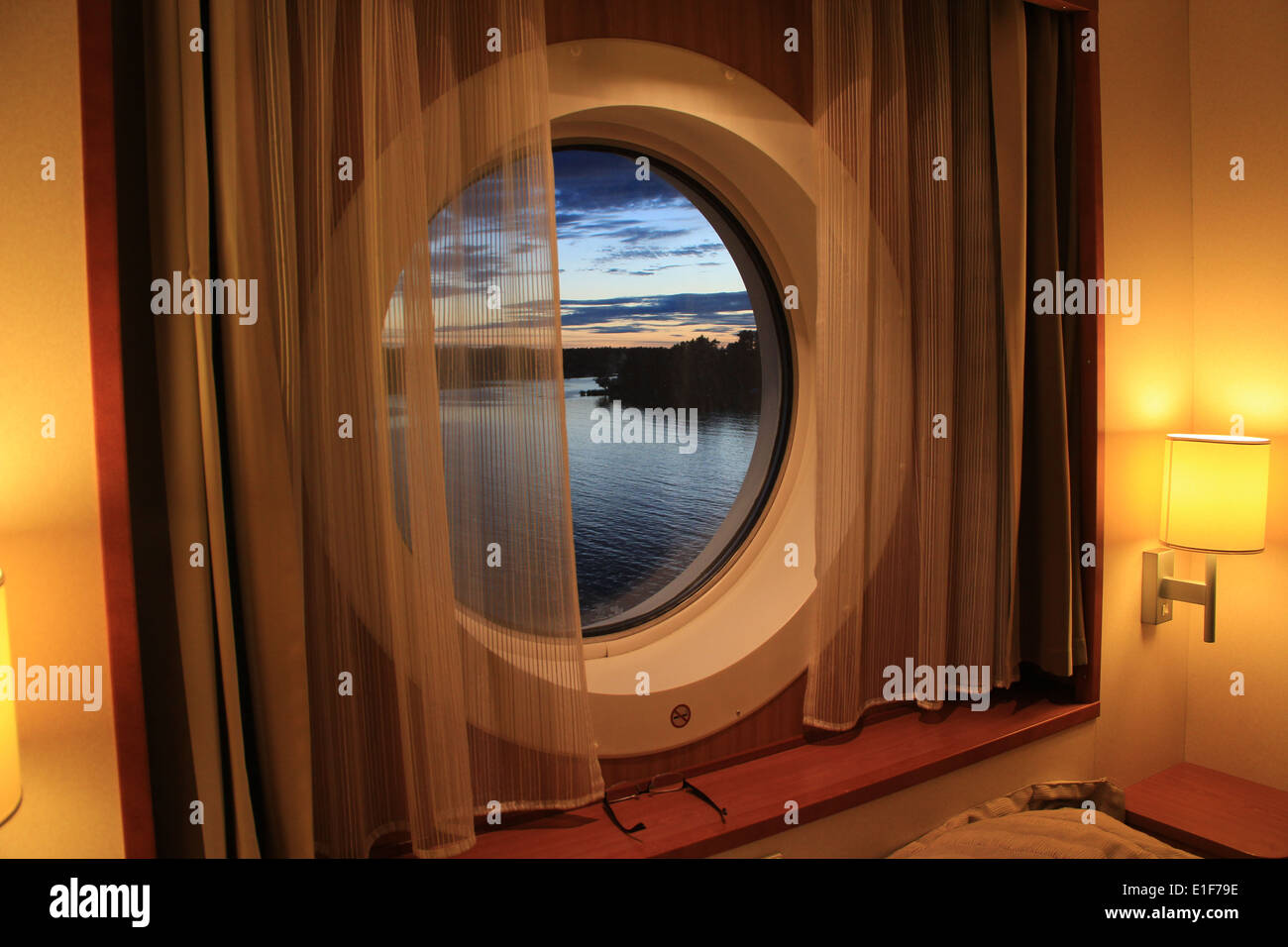 sunset view from boat window in stockholm Stock Photo - Alamy