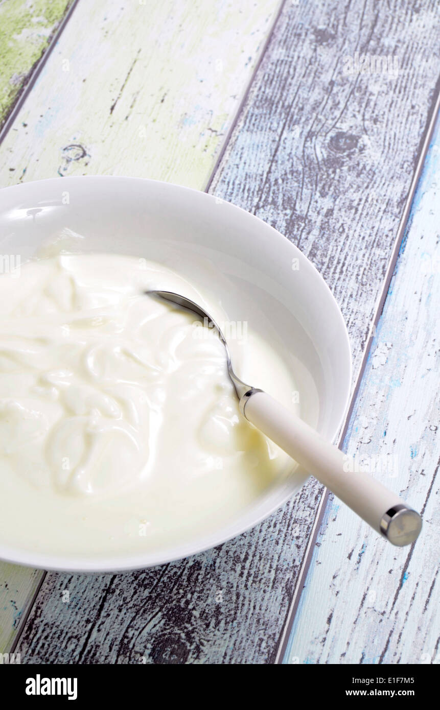 Fresh natural Yogurt pur in a bowl Stock Photo - Alamy