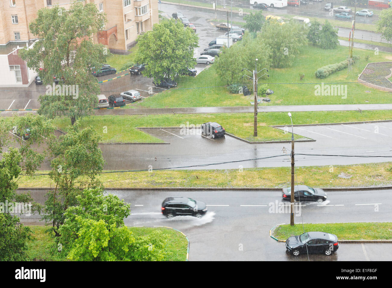 above view of urban street in pouring rain in summer day Stock Photo ...