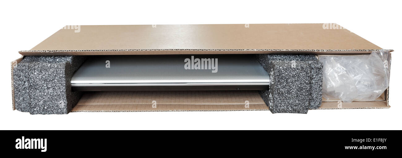 unpacking new laptop from cardboard box isolated on white background ...