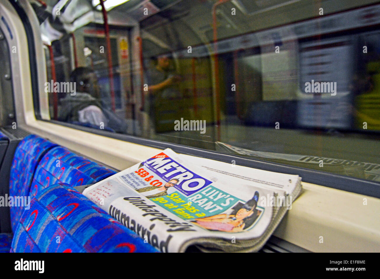 Newspaper on the tube hi-res stock photography and images - Alamy