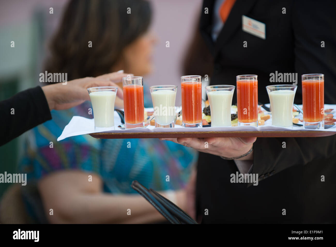 small cocktails and starters being served by the waiter Stock Photo - Alamy