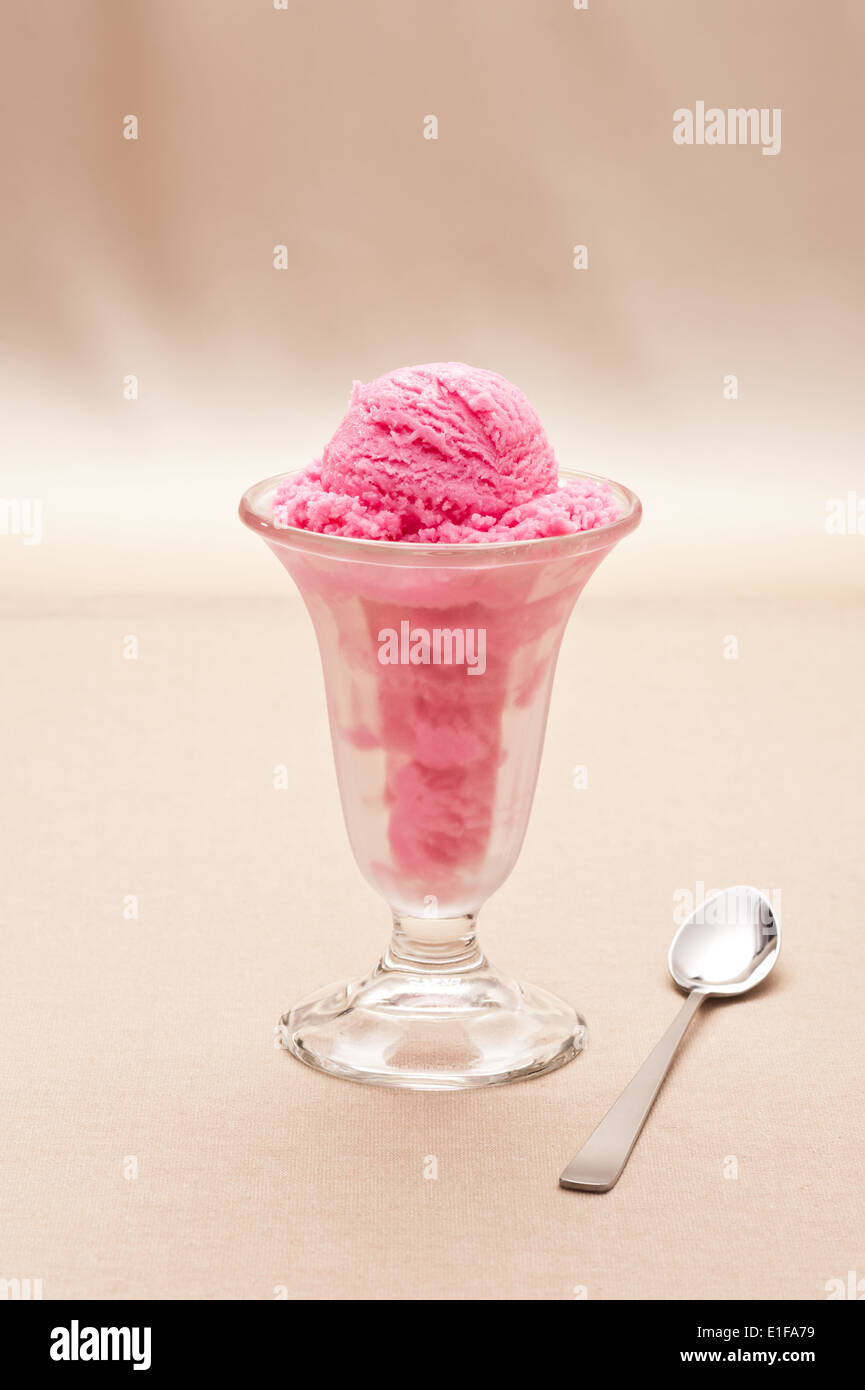 Raspberry ice cream in a tall glass Stock Photo - Alamy