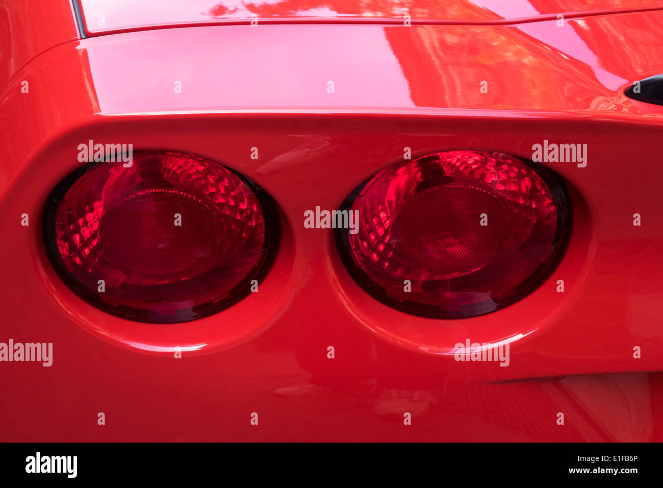Detail with rear lights on a red Corvette Stock Photo - Alamy
