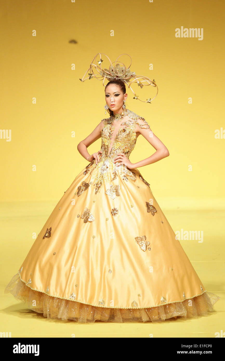 A model presents a creation of Edwin Uy during the Philippine Fashion ...