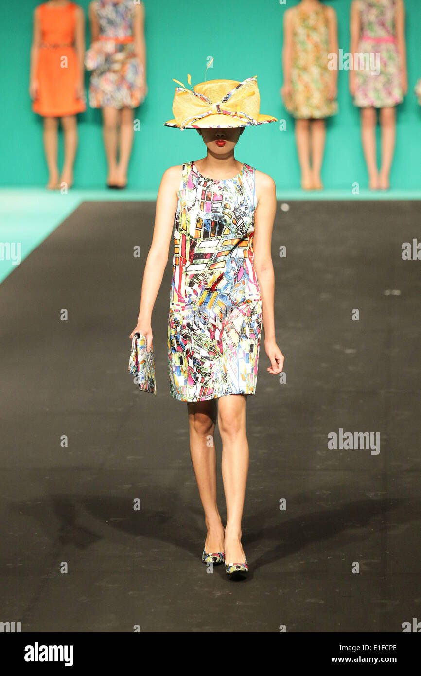A model presents a creation of ESAC apparel during the Philippine ...