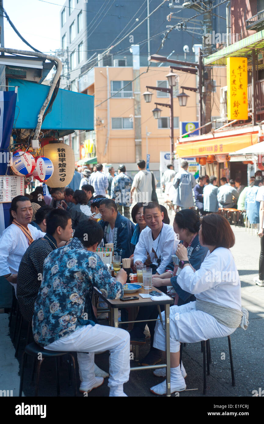 Tokyo Japan - People eating outdoors at food stall Asakusa district ...