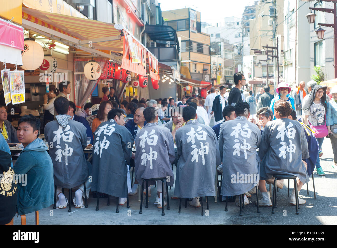 Tokyo Japan - Street scene with people eating outside during a sanja ...