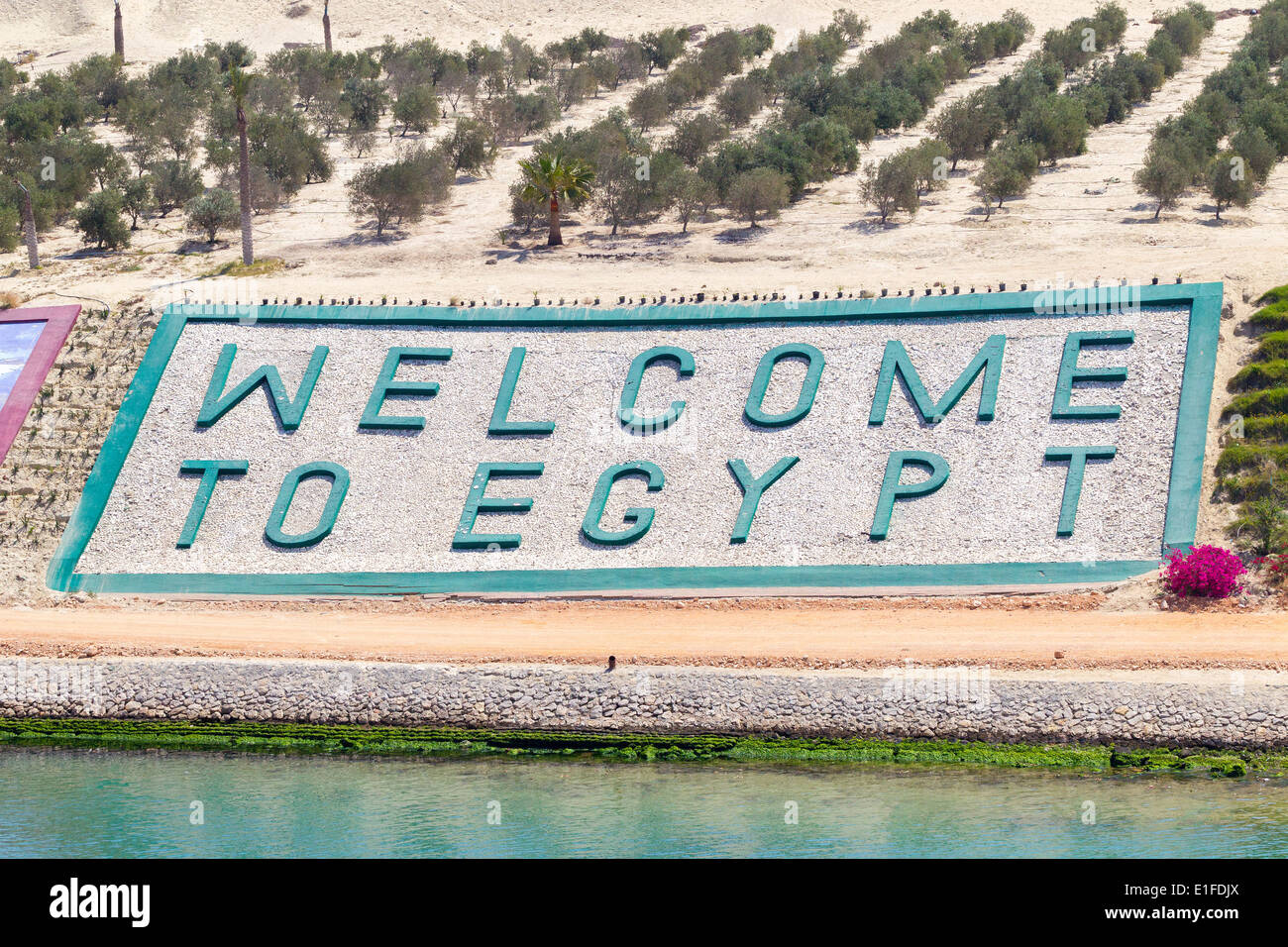 Sign on the edge of the Suez Canal Egypt Stock Photo - Alamy