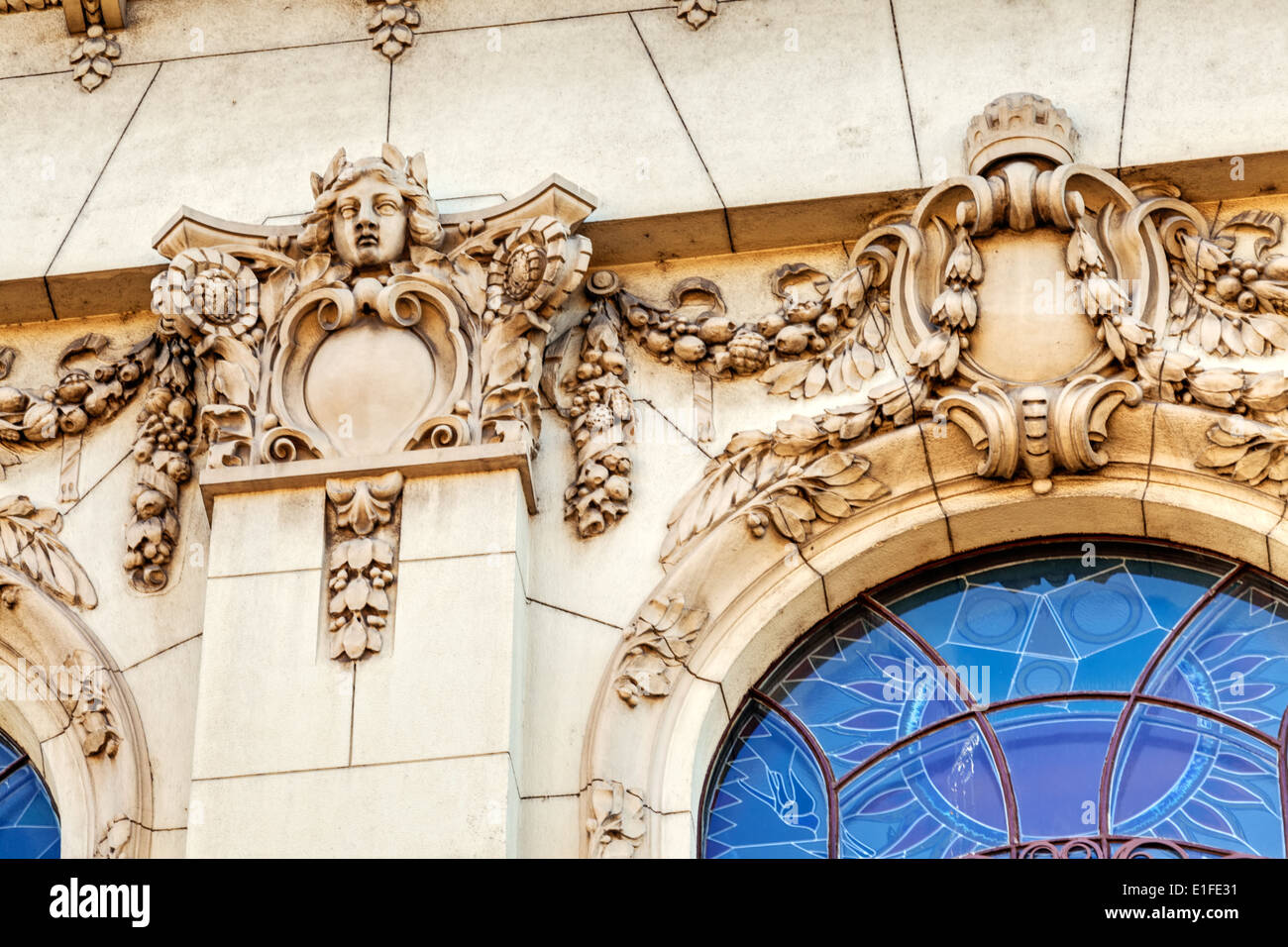 stone facade on classical building with ornaments and sculptures Stock ...