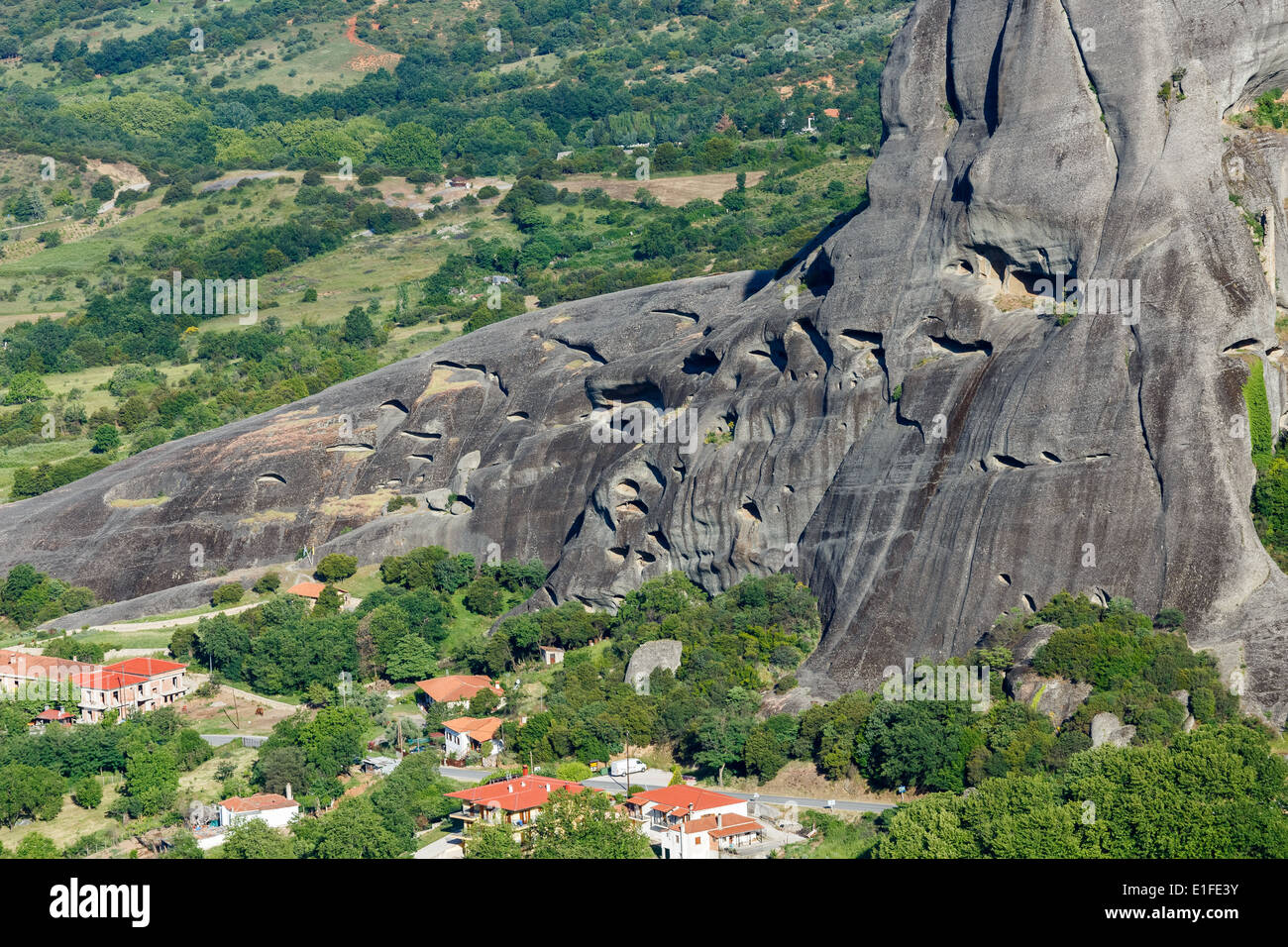 Abandoned monastic cave houses known as "cells" in Meteora (meaning ...