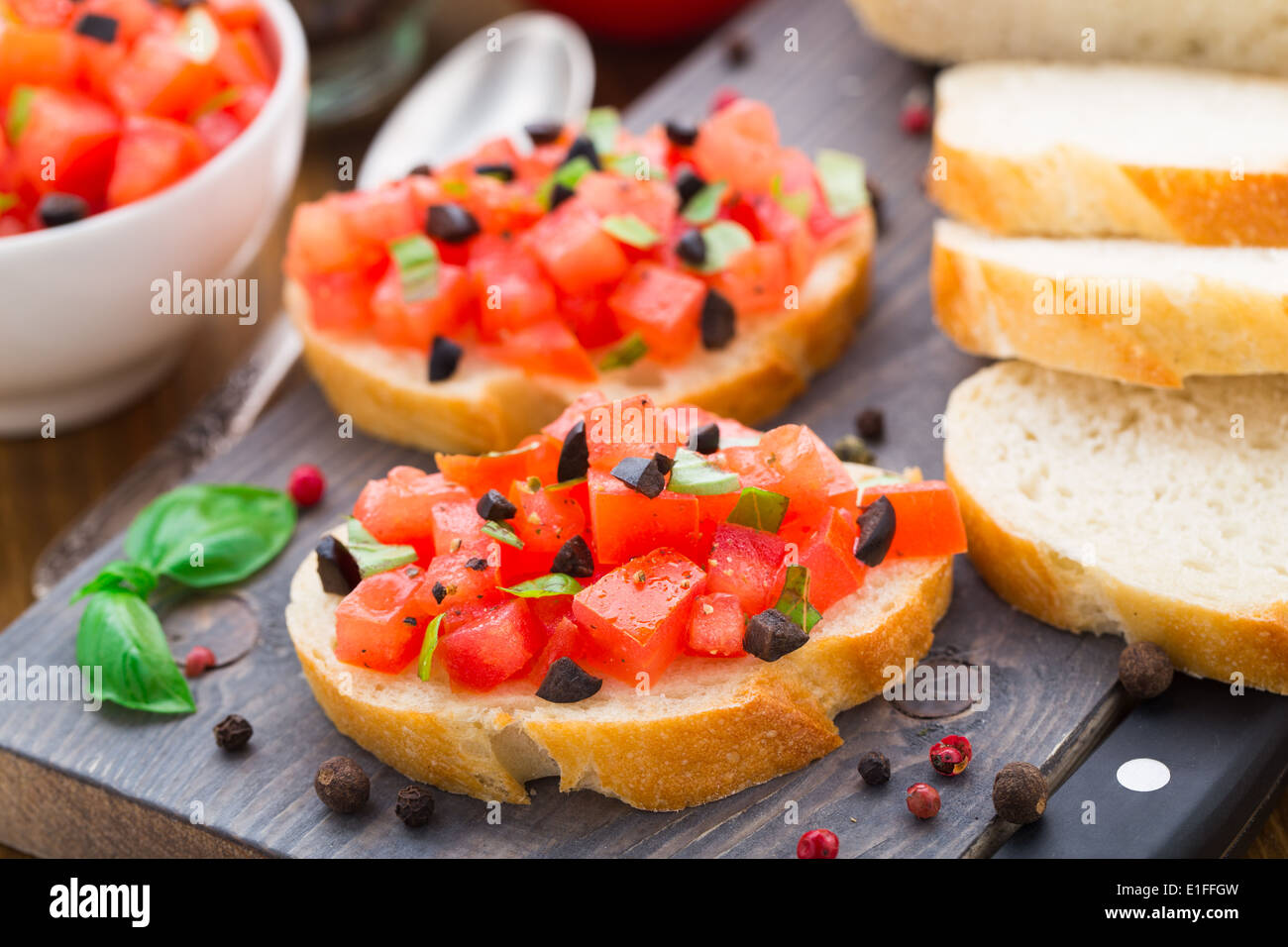 Italian bruschetta with tomatoes and basil Stock Photo - Alamy