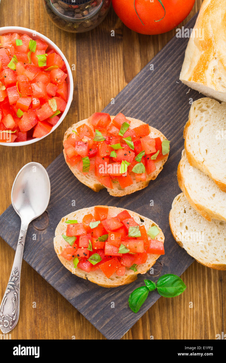 Italian Bruschetta With Tomatoes And Basil Stock Photo Alamy