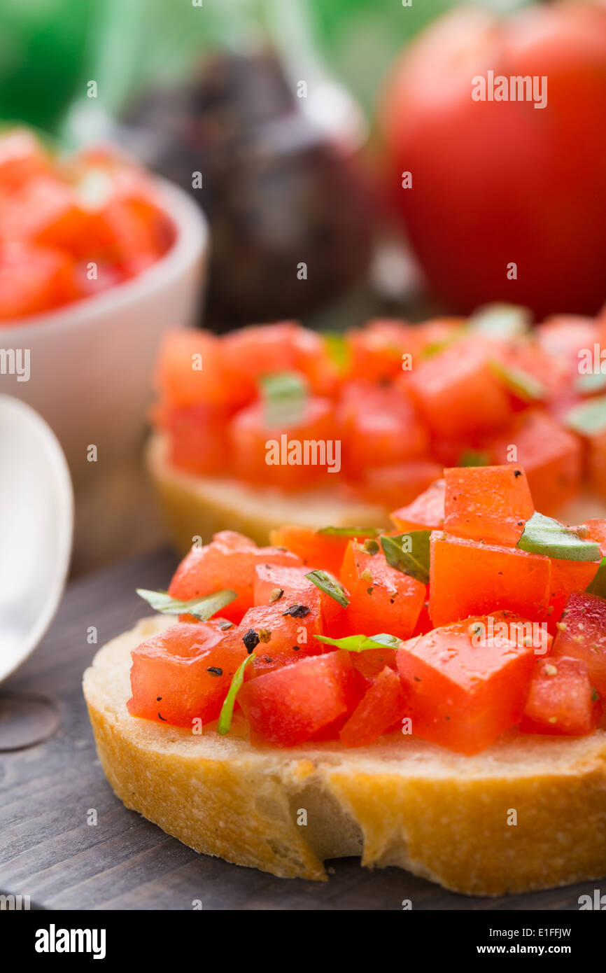 Italian Bruschetta With Tomatoes And Basil Stock Photo Alamy