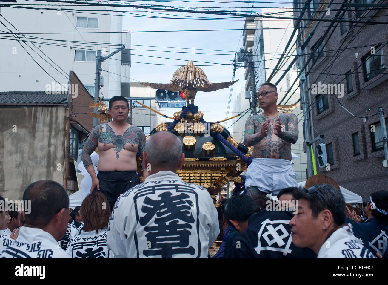 Tokyo, Japan - May 2014 - People attend to see carrying portable Shinto ...
