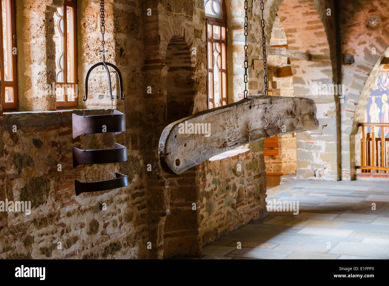 Pluck of wood and hammer used to summon people to prayers in monastery ...