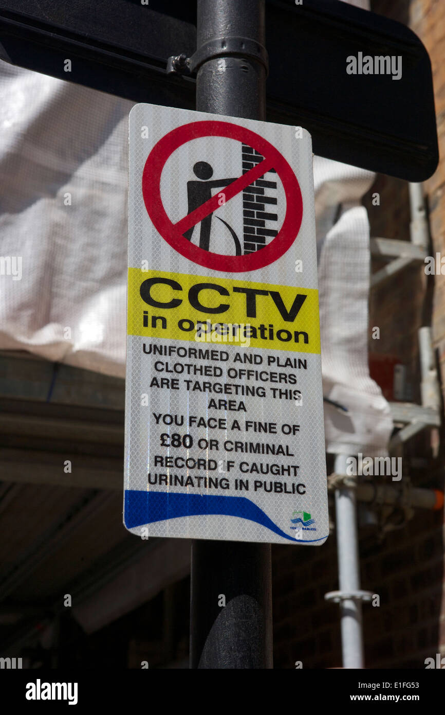 CCTV to catch public urination, Brick Lane, London Stock Photo - Alamy