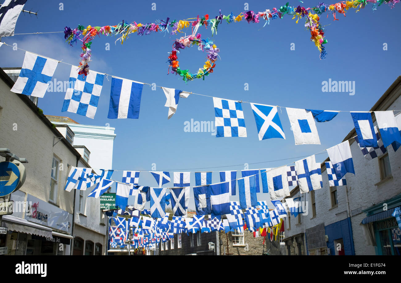 Flags strung across the streets of Padstow for the May Day celebrations ...