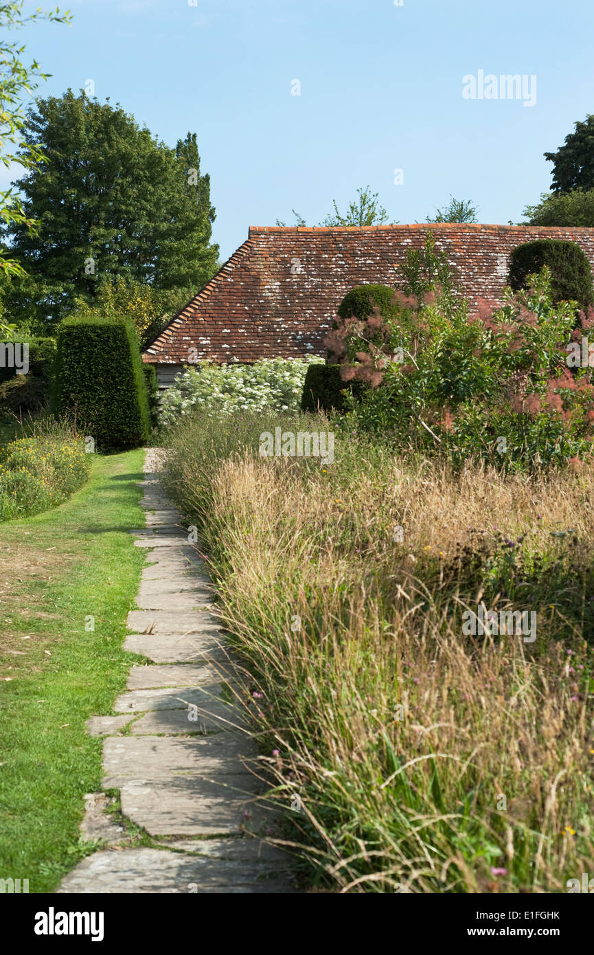 The Topiary Lawn created by the gardener Christopher Lloyd at Great Dixter in Northiam, East ...
