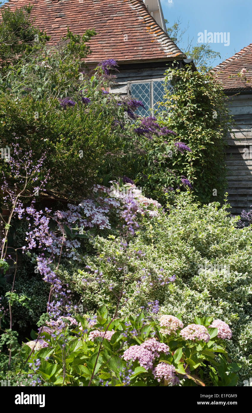 The Barn Garden created by the gardener Christopher Lloyd at Great Dixter in Northiam, East ...