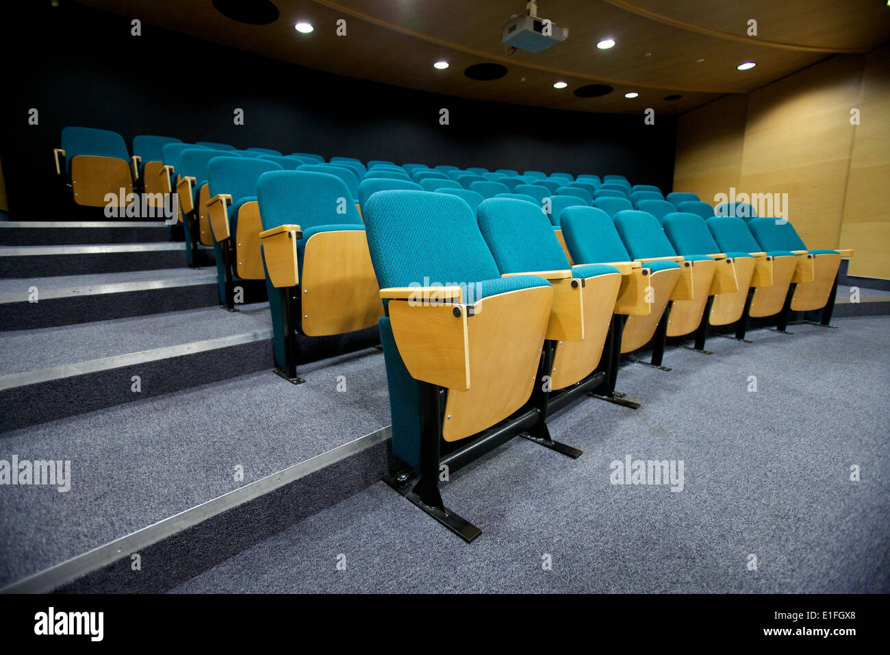 Lecture theatre seating in auditorium setting Stock Photo - Alamy