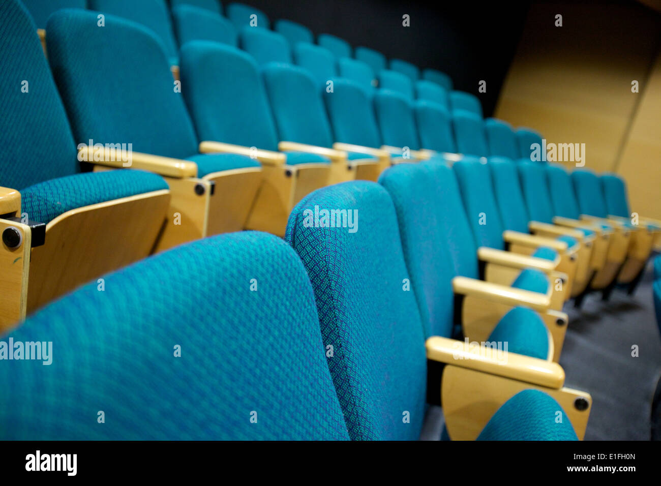 Lecture theatre seating in auditorium setting Stock Photo - Alamy