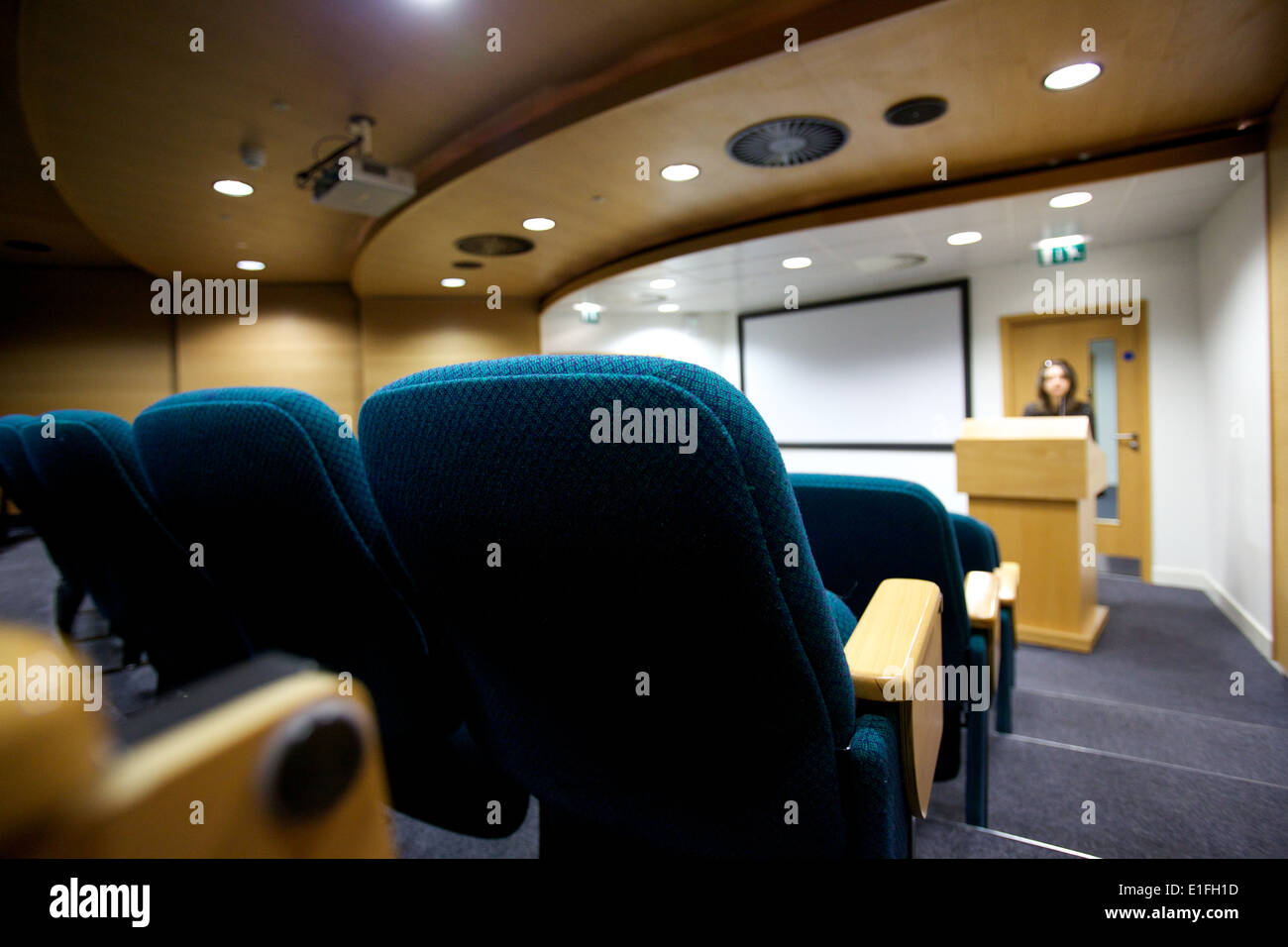 Lecture theatre seating in auditorium setting Stock Photo - Alamy