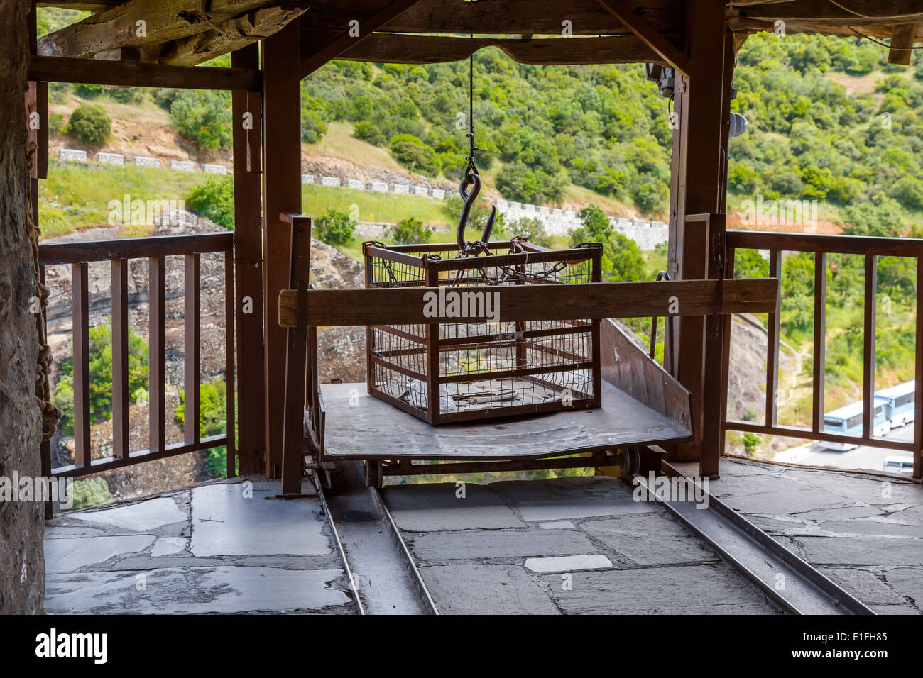 Metal winch and cage for packets transfer in Varlaam monastery, Meteora ...