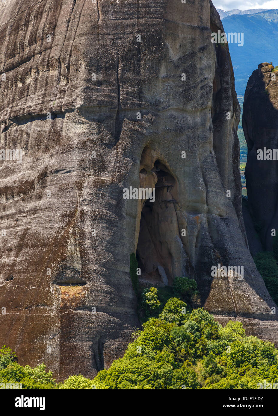 Abandoned monastic cave houses known as "cells" in Meteora (meaning ...