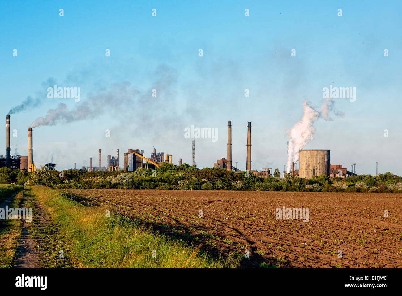 Rural landscape with factory Stock Photo - Alamy