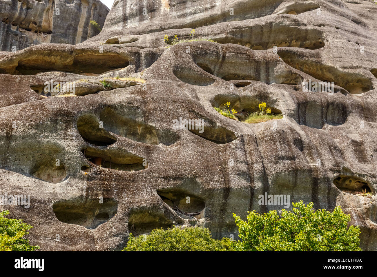 Abandoned monastic cave houses known as "cells" in Meteora (meaning ...