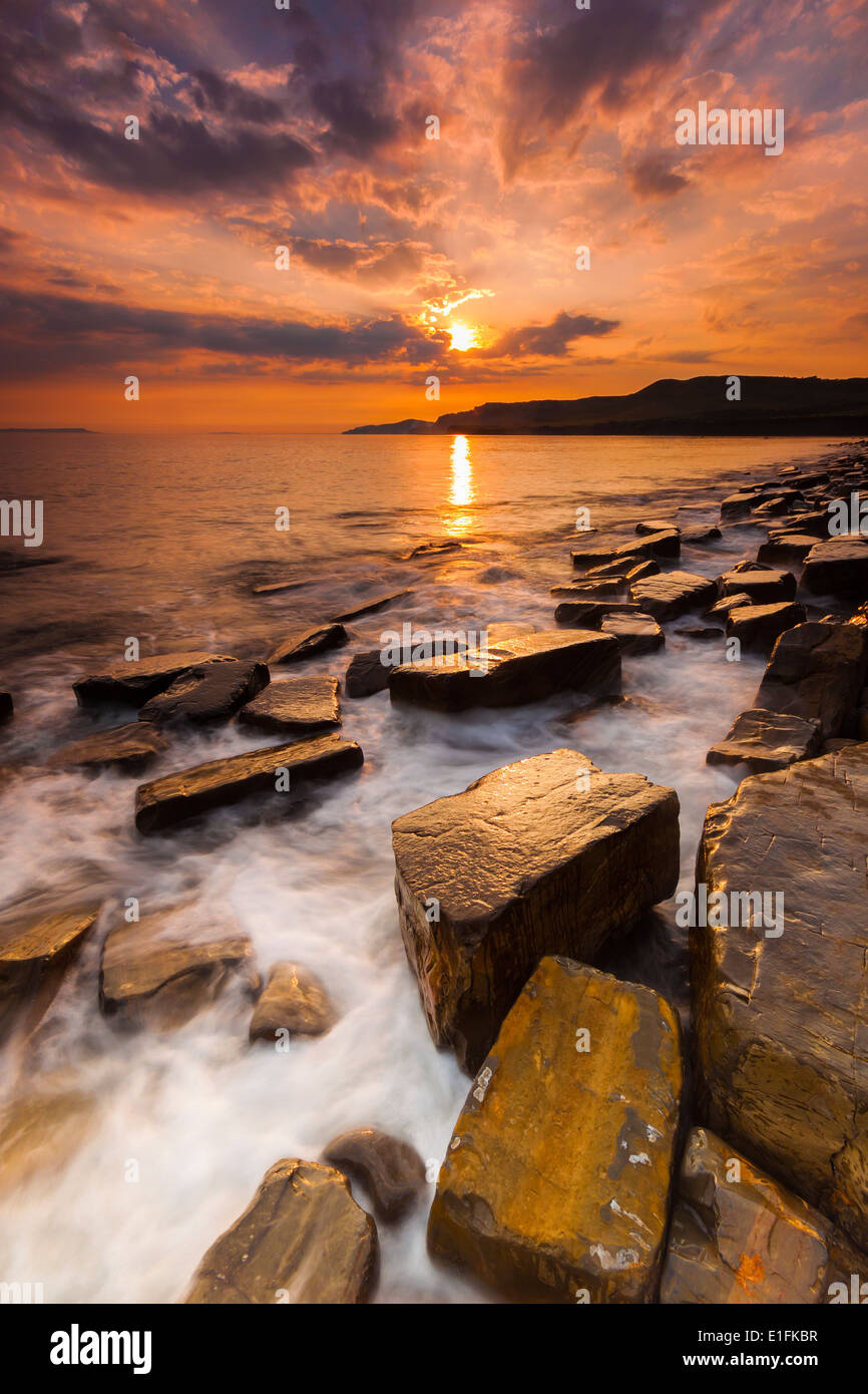 Waves wash over the rocks at Kimmeridge in Dorset Stock Photo - Alamy