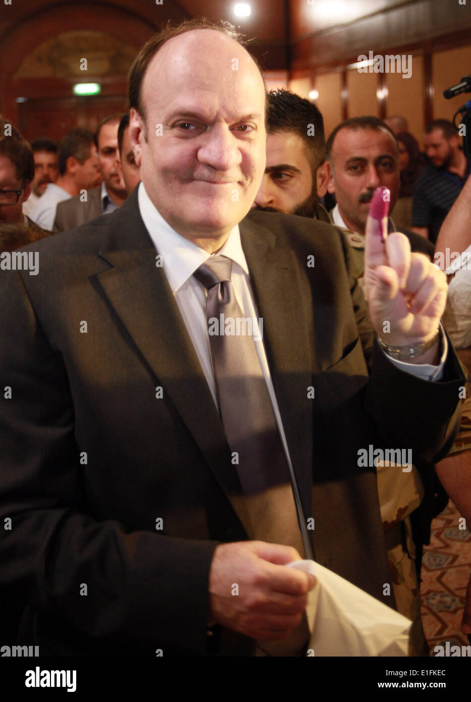 Damascus, Syria. 3rd June, 2014. Hassan Abdallah al-Nuri(L), one of the ...