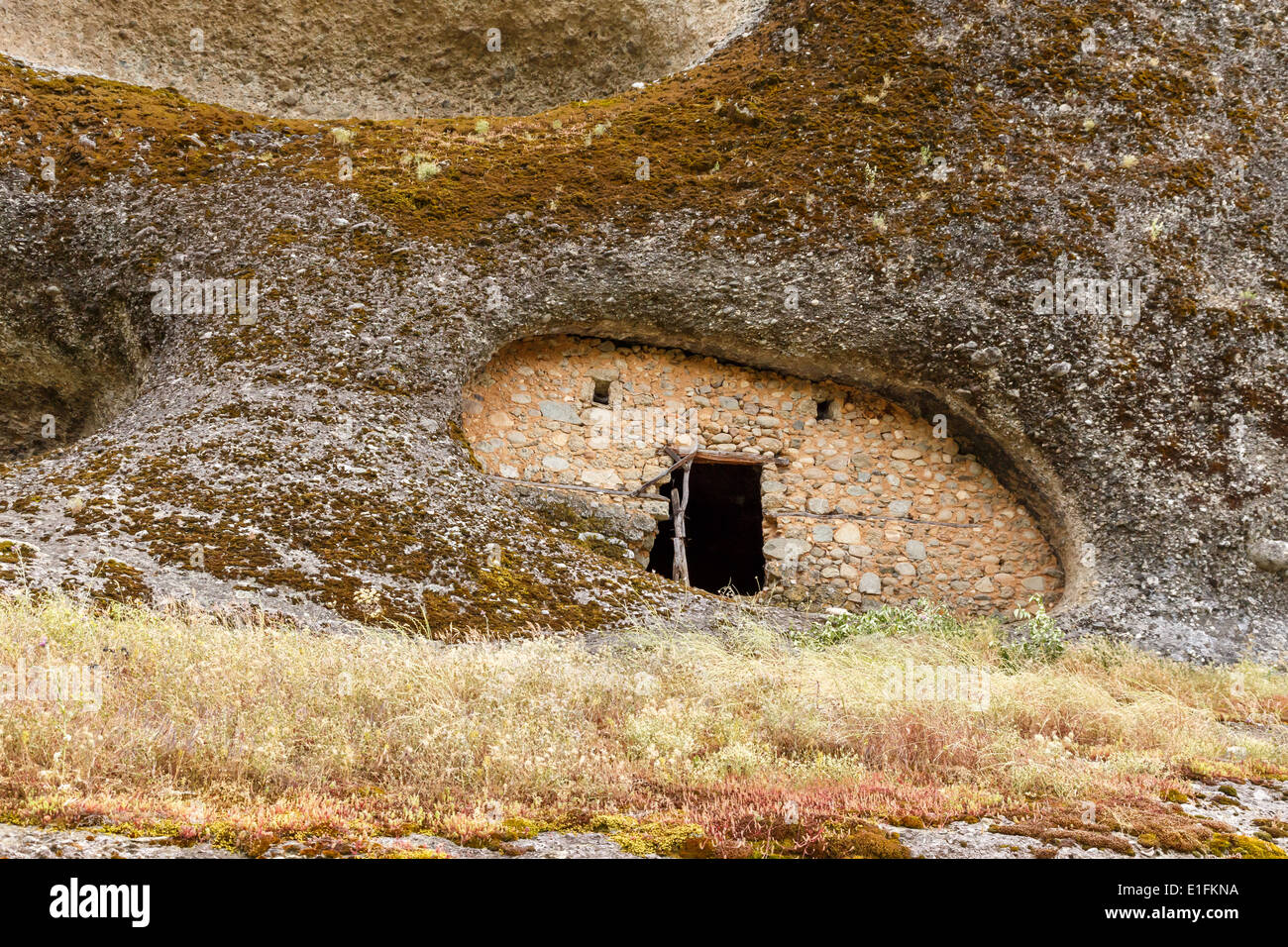 Abandoned monastic cave houses known as "cells" in Meteora (meaning ...