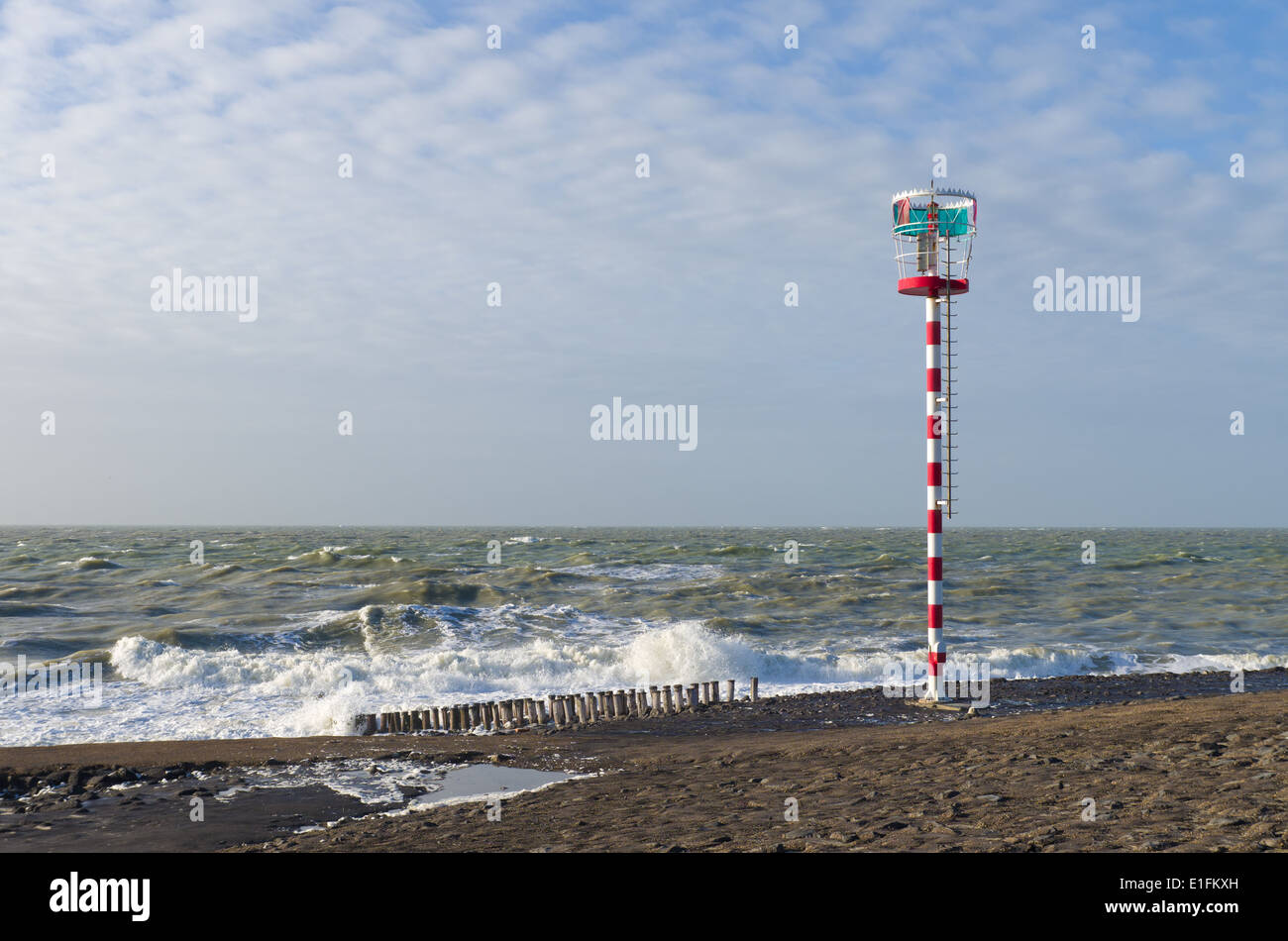 small light beacon at the North Sea in netherlands Stock Photo - Alamy
