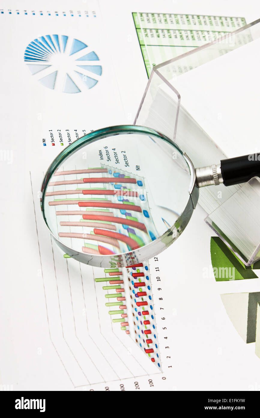 pen, magnifying glass and the working paper with a diagram Stock Photo ...