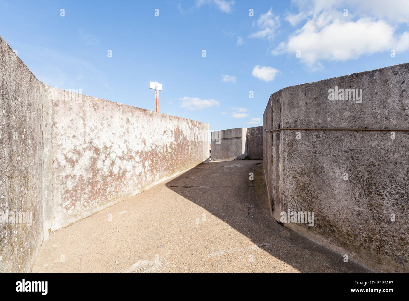 Concrete walkway or ramp with walls in the Brutalist architectural ...