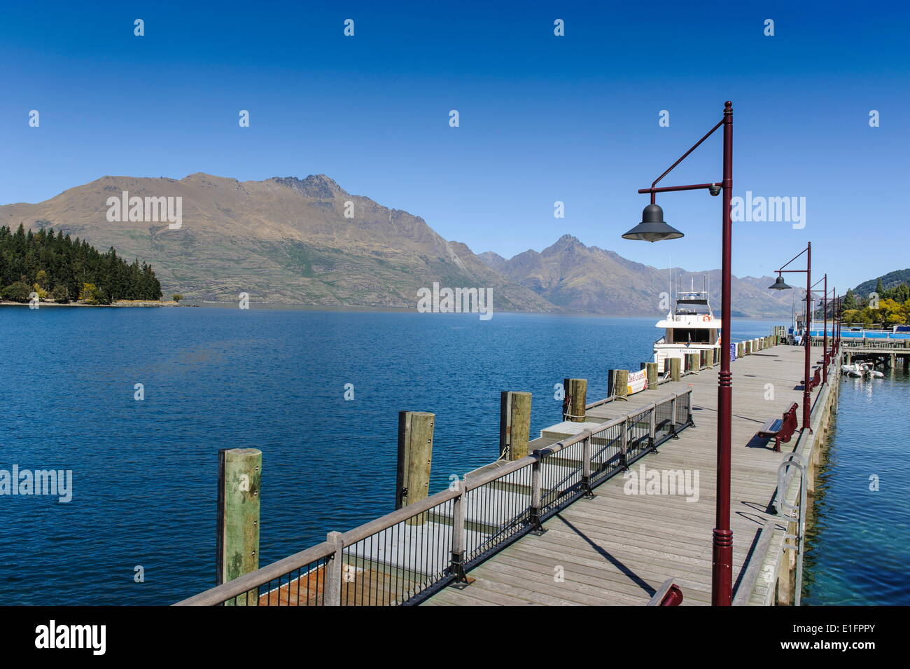 Wooden pier in queenstown hi-res stock photography and images - Alamy