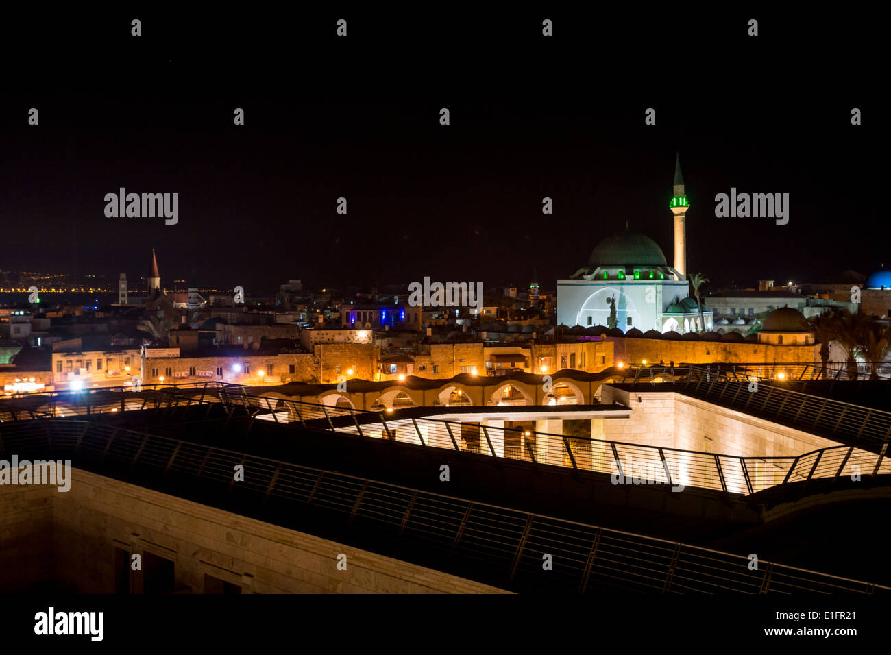Israel. The city of Acre at night. The Al-Jezzar Mosque is seen on the ...