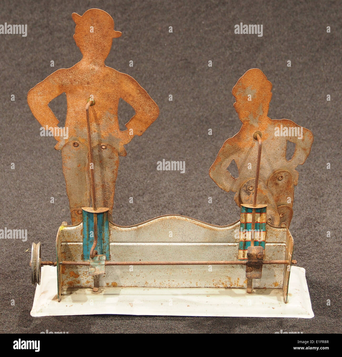 Two tin toy movable figures Stock Photo - Alamy